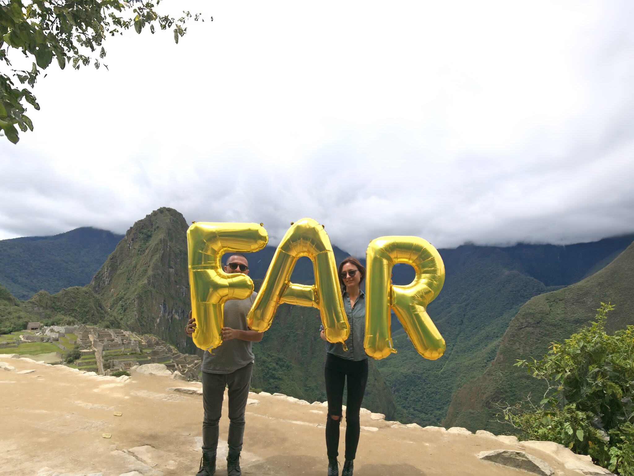 Golden balloons at House of the Guardian to the Funerary Rock, Peru – Far